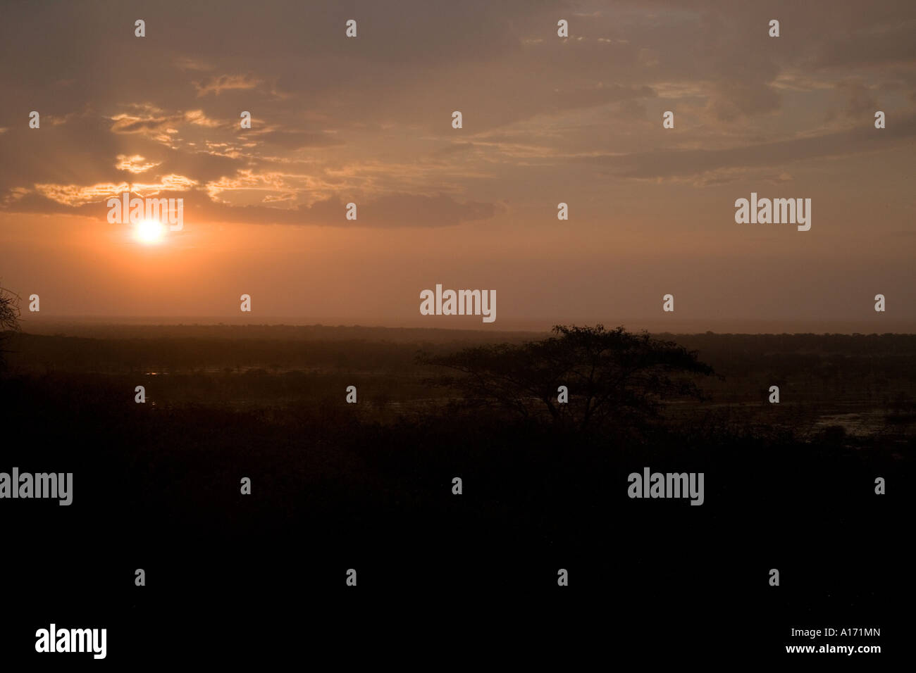 Sunset in the rain Stock Photo - Alamy