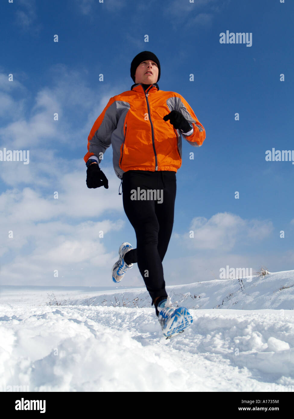 runner in the snow Stock Photo - Alamy