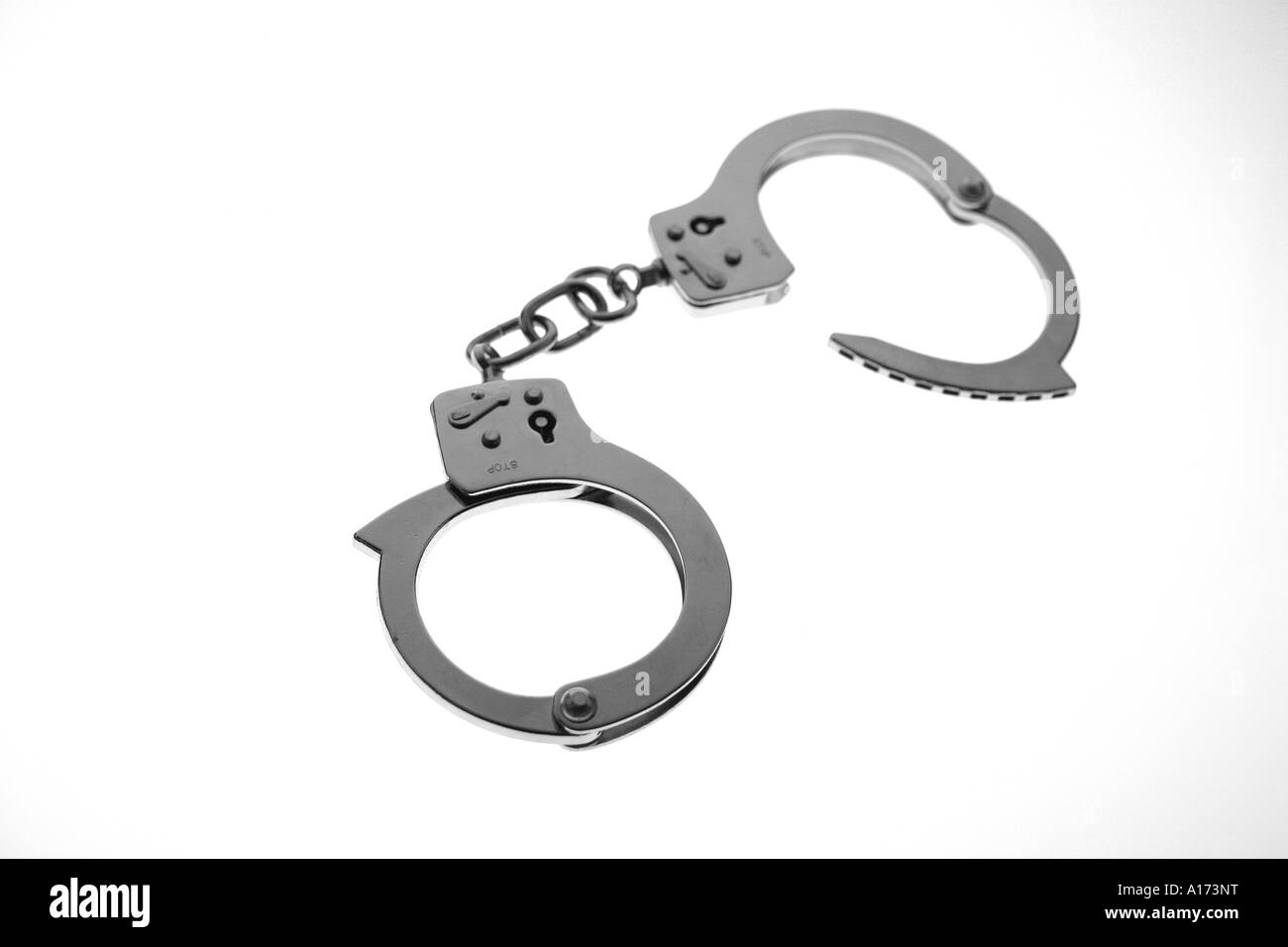 Hand cuffs Black and White Stock Photos & Images - Alamy