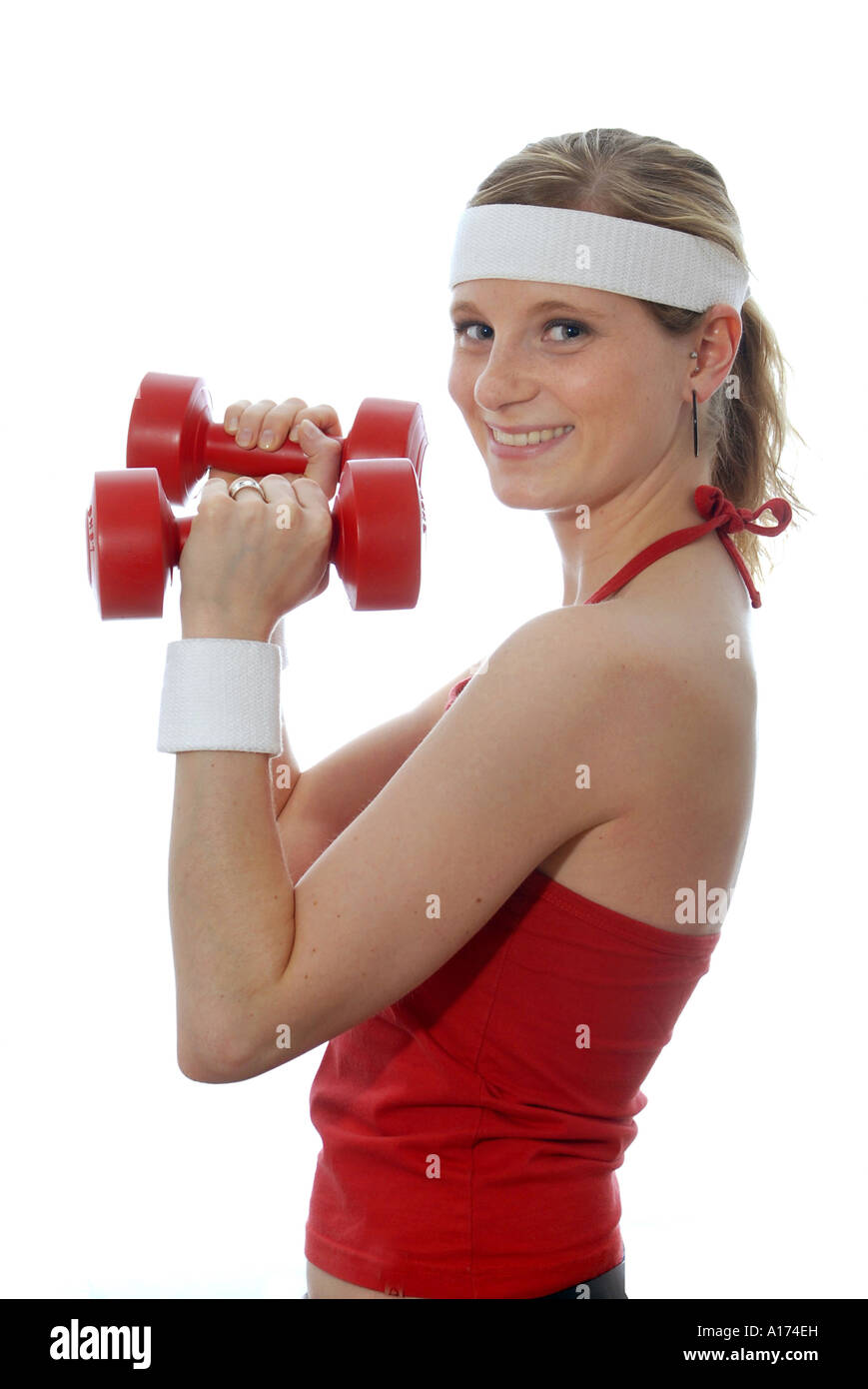 Woman with dumbbells Stock Photo - Alamy