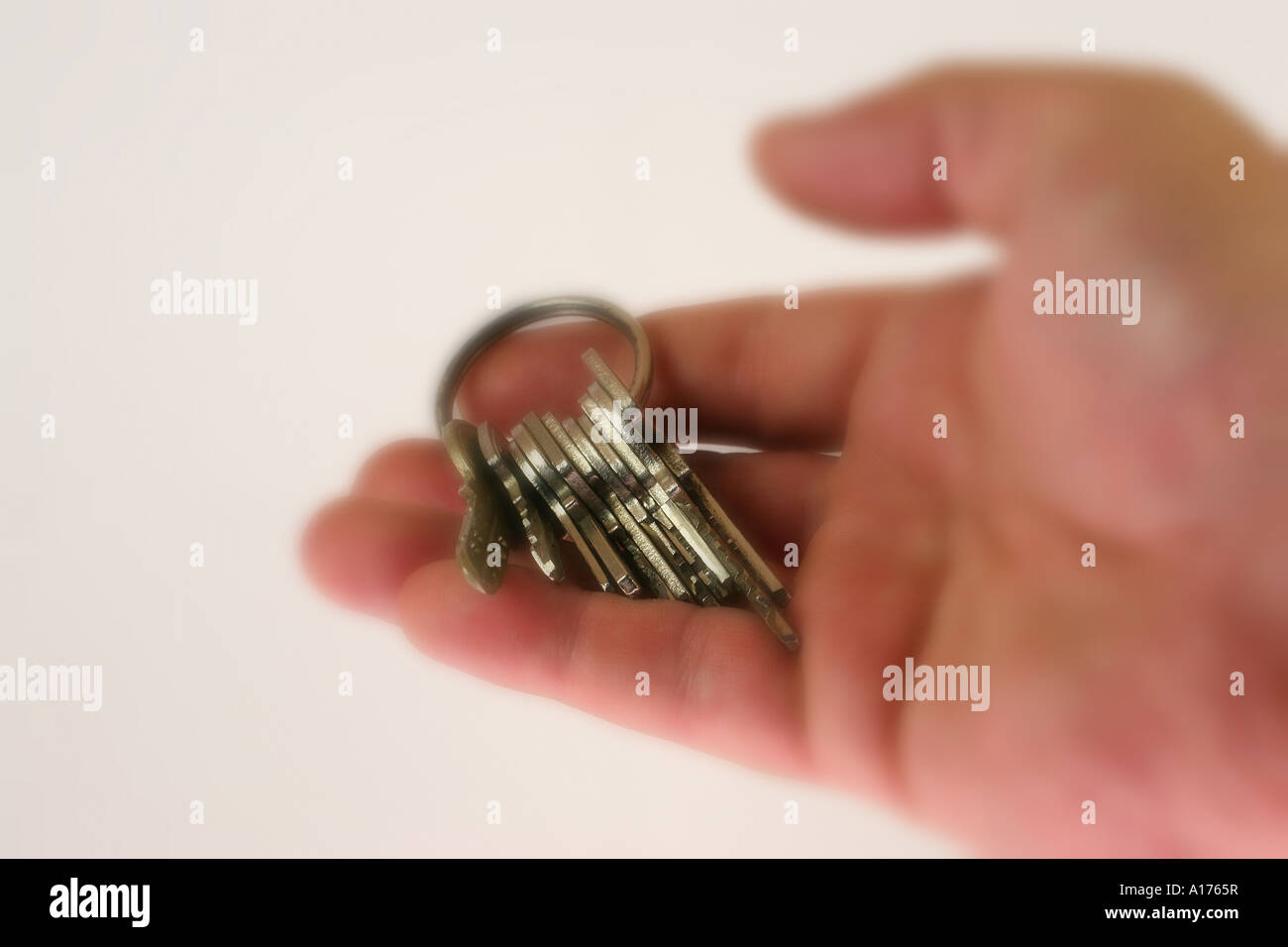hand with a bunch of keys Stock Photo - Alamy