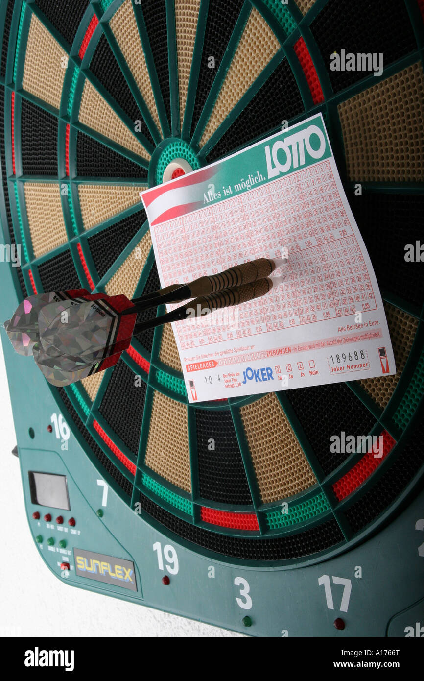lottery ticket and darts Stock Photo - Alamy