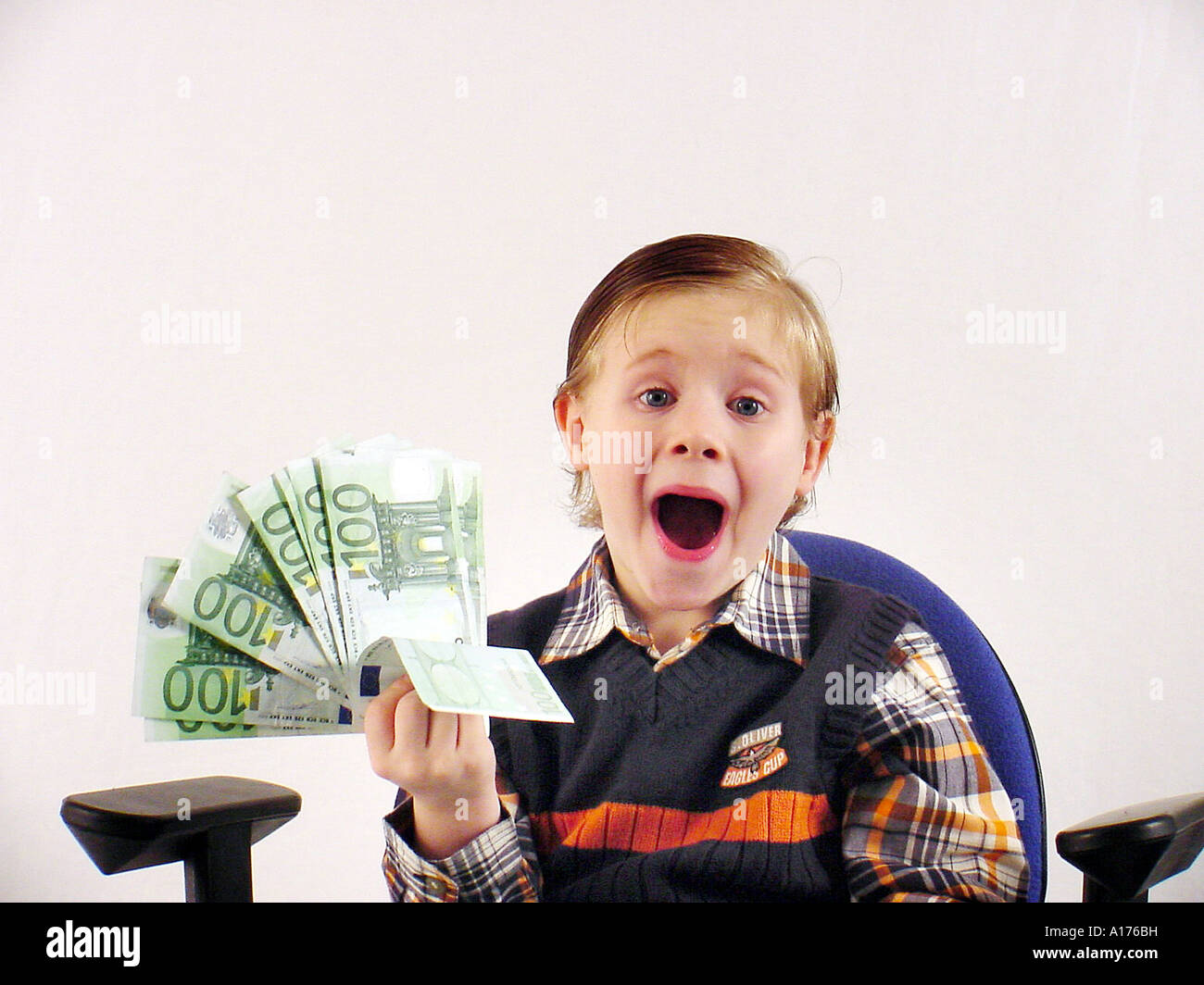 boy with money Stock Photo - Alamy