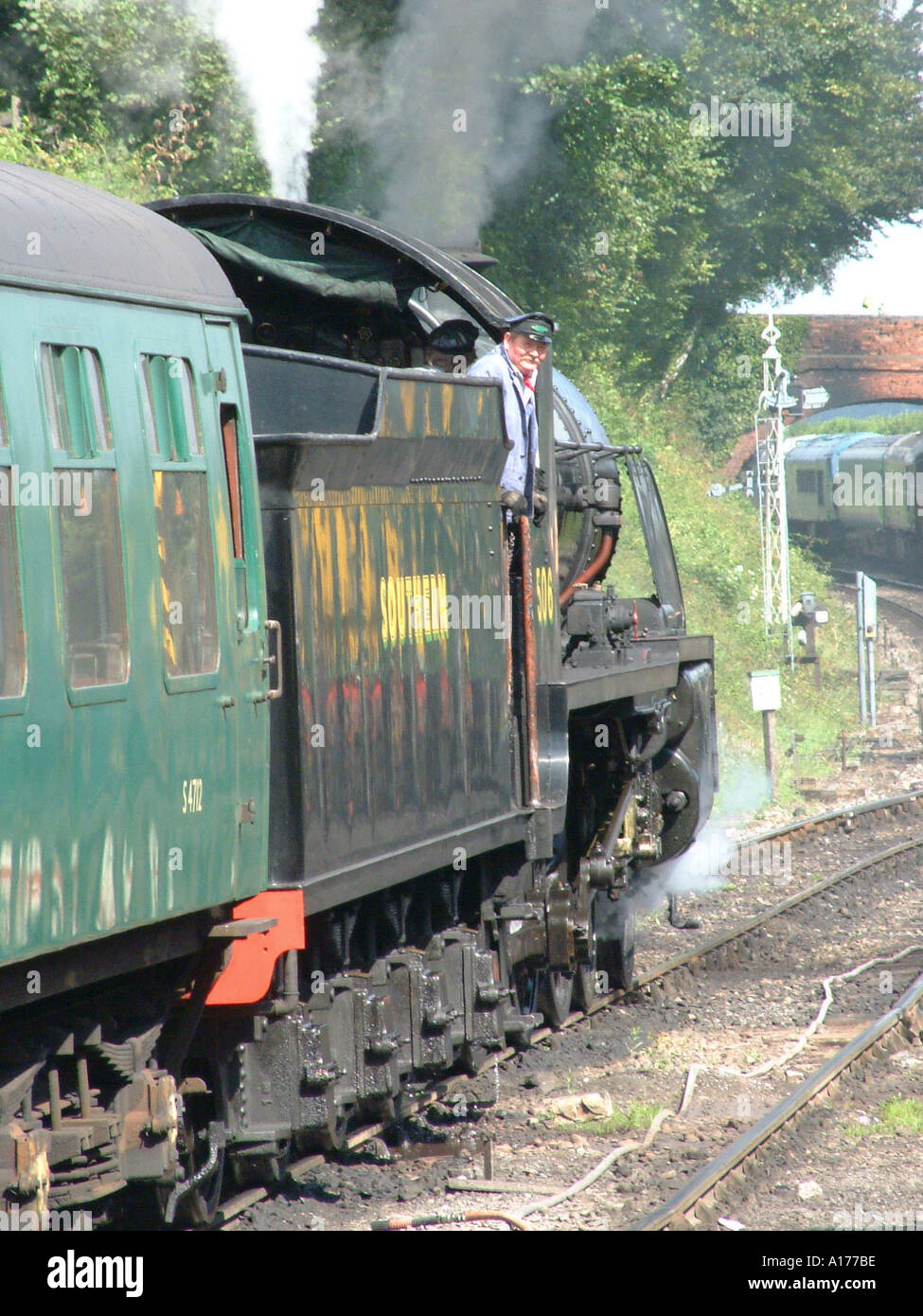 Pulling Away Steam train pulls away from the platform at Ropley Stock ...