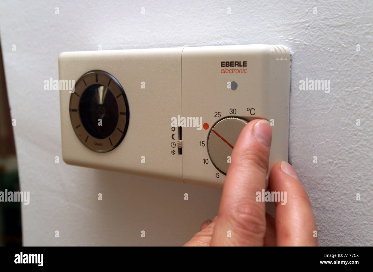 Temperature regulator of a heating system Stock Photo - Alamy