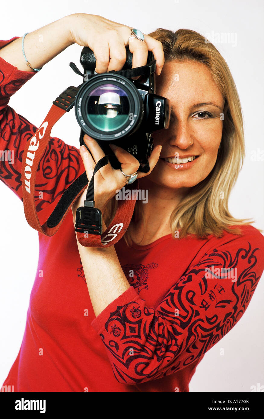 Woman with camera Stock Photo - Alamy