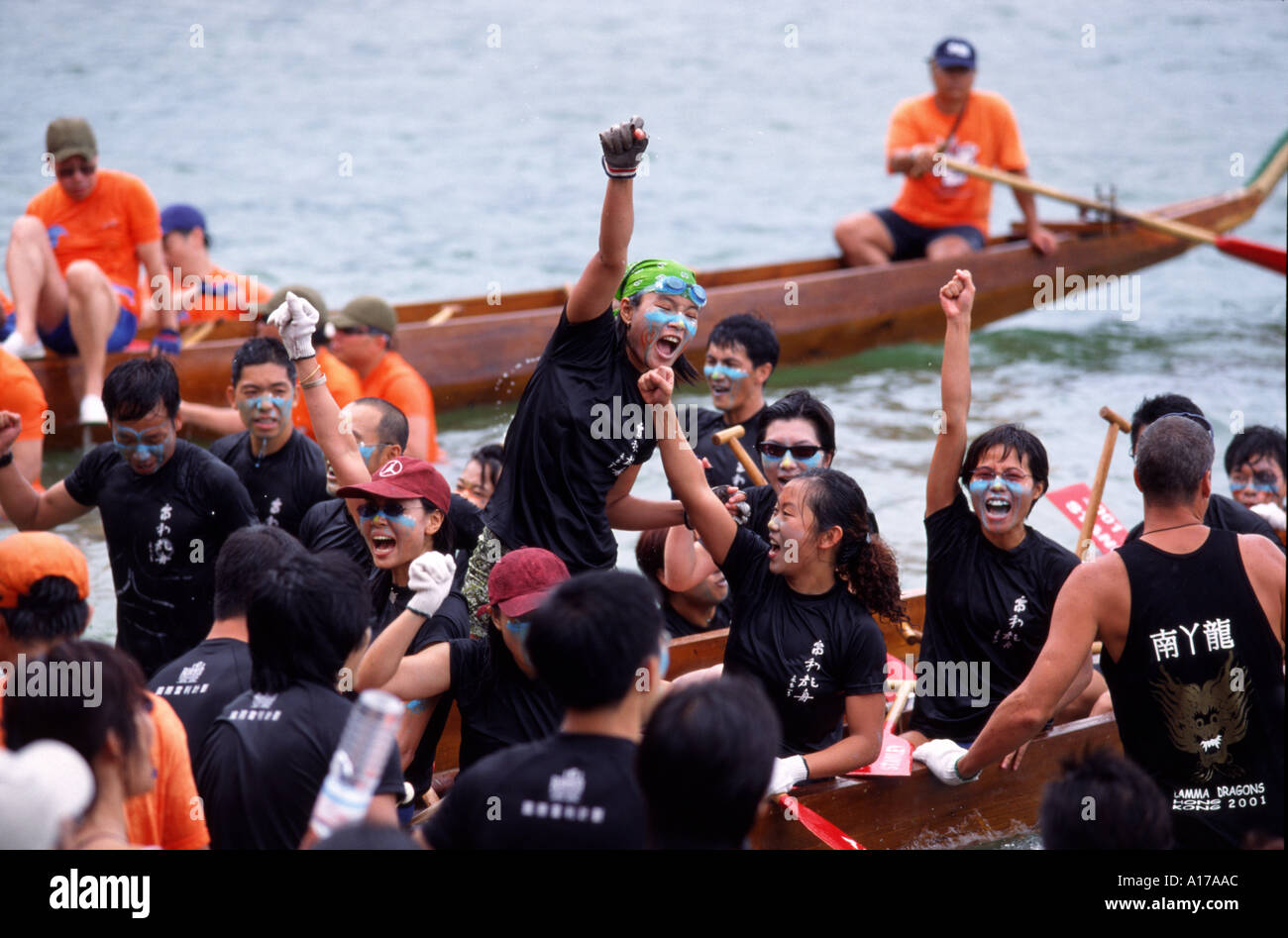 Winning team celebrates at the Dragon Boat races in Hong Kong Stock ...