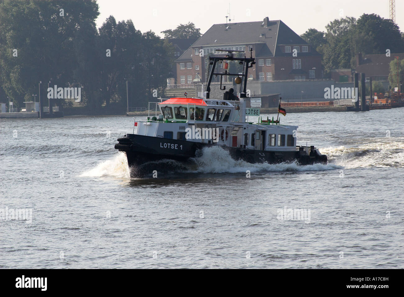 Boat river ship pilot barge bow wave hi-res stock photography and ...