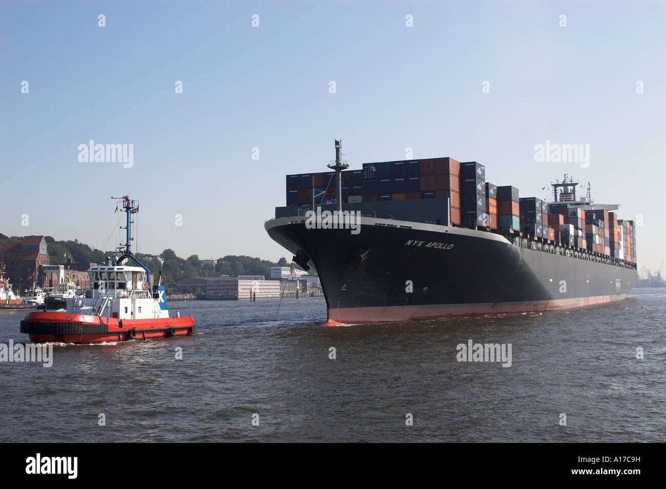 towed container ship Stock Photo - Alamy