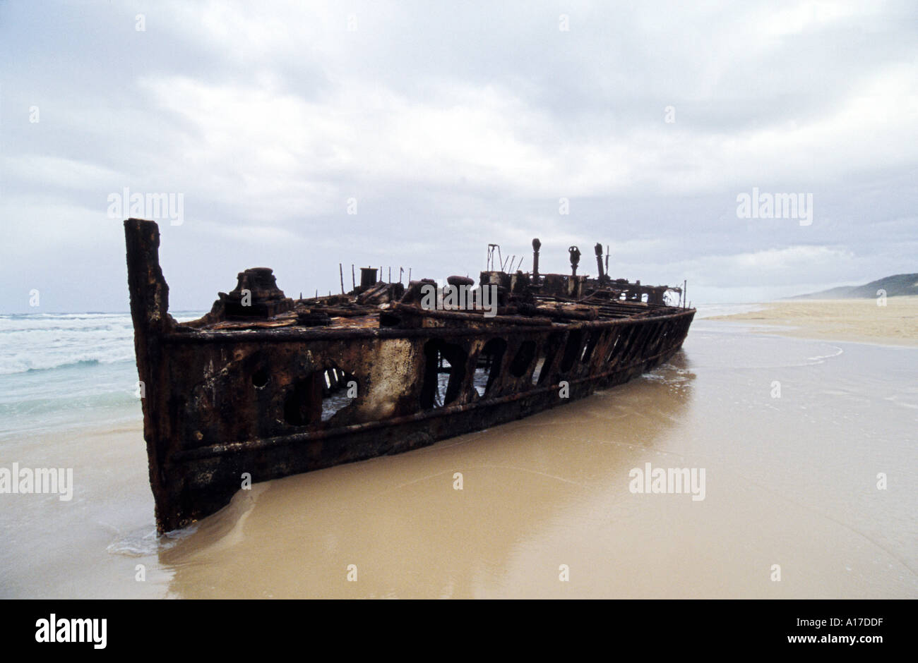 Old shipwreck in the sand Stock Photo - Alamy