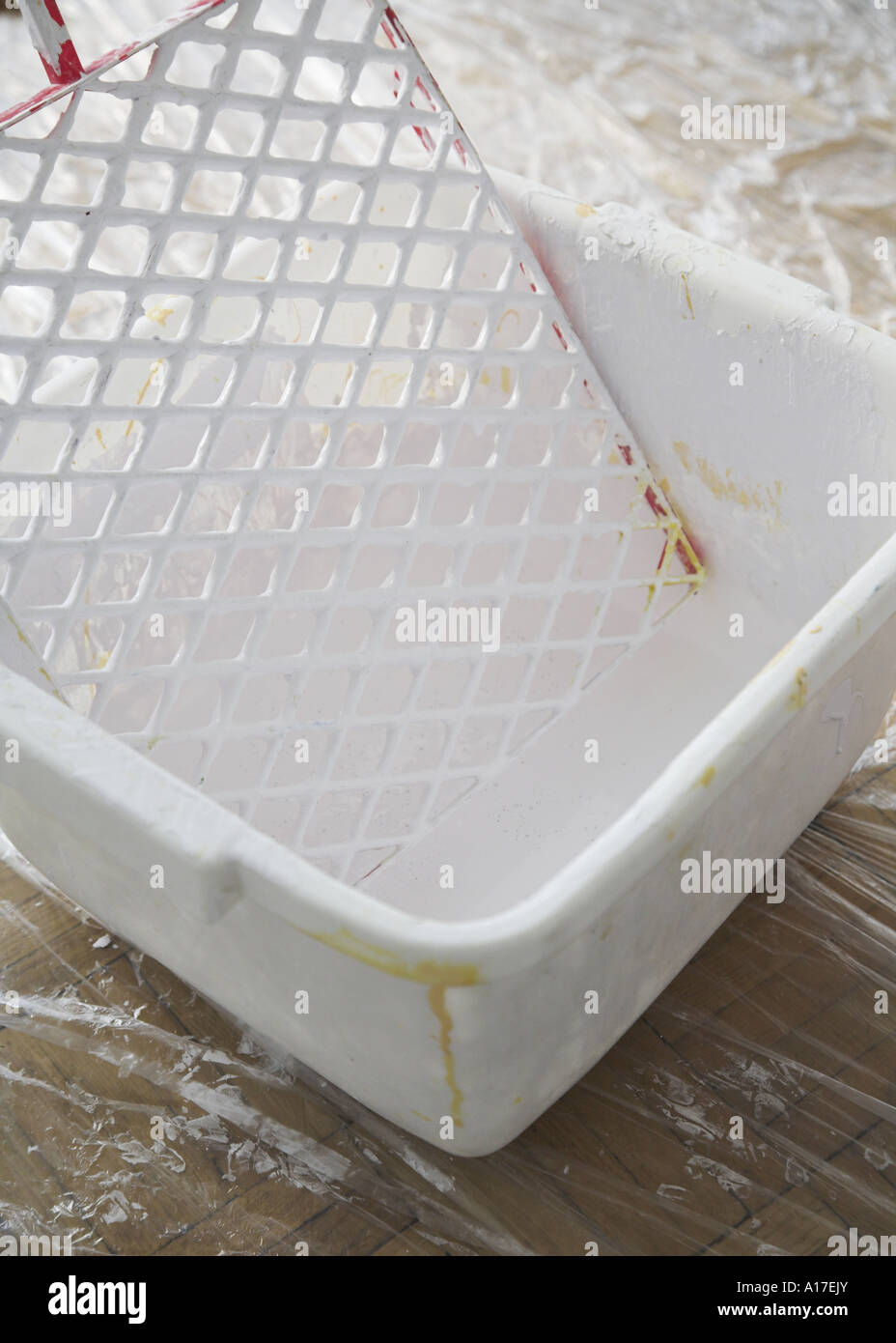 Container with grid and white paint Stock Photo - Alamy
