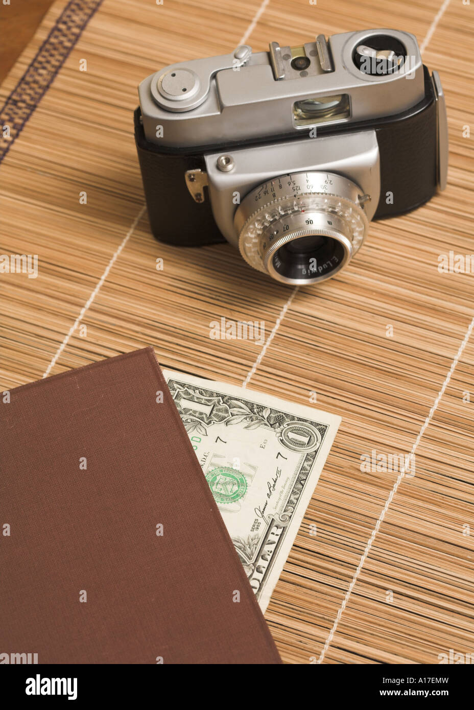 Old camera, book and money Stock Photo - Alamy