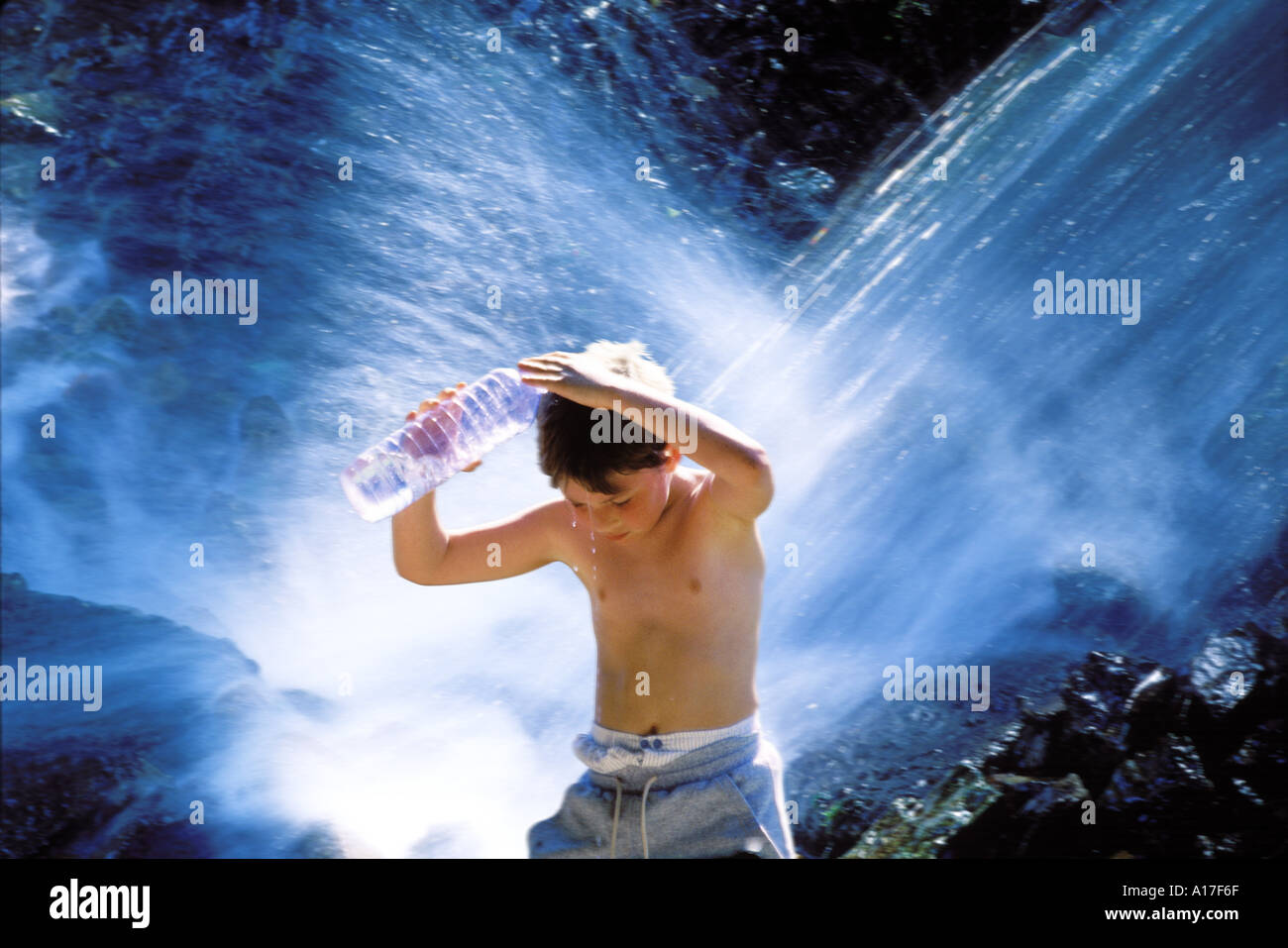 young boy getting cool Stock Photo - Alamy