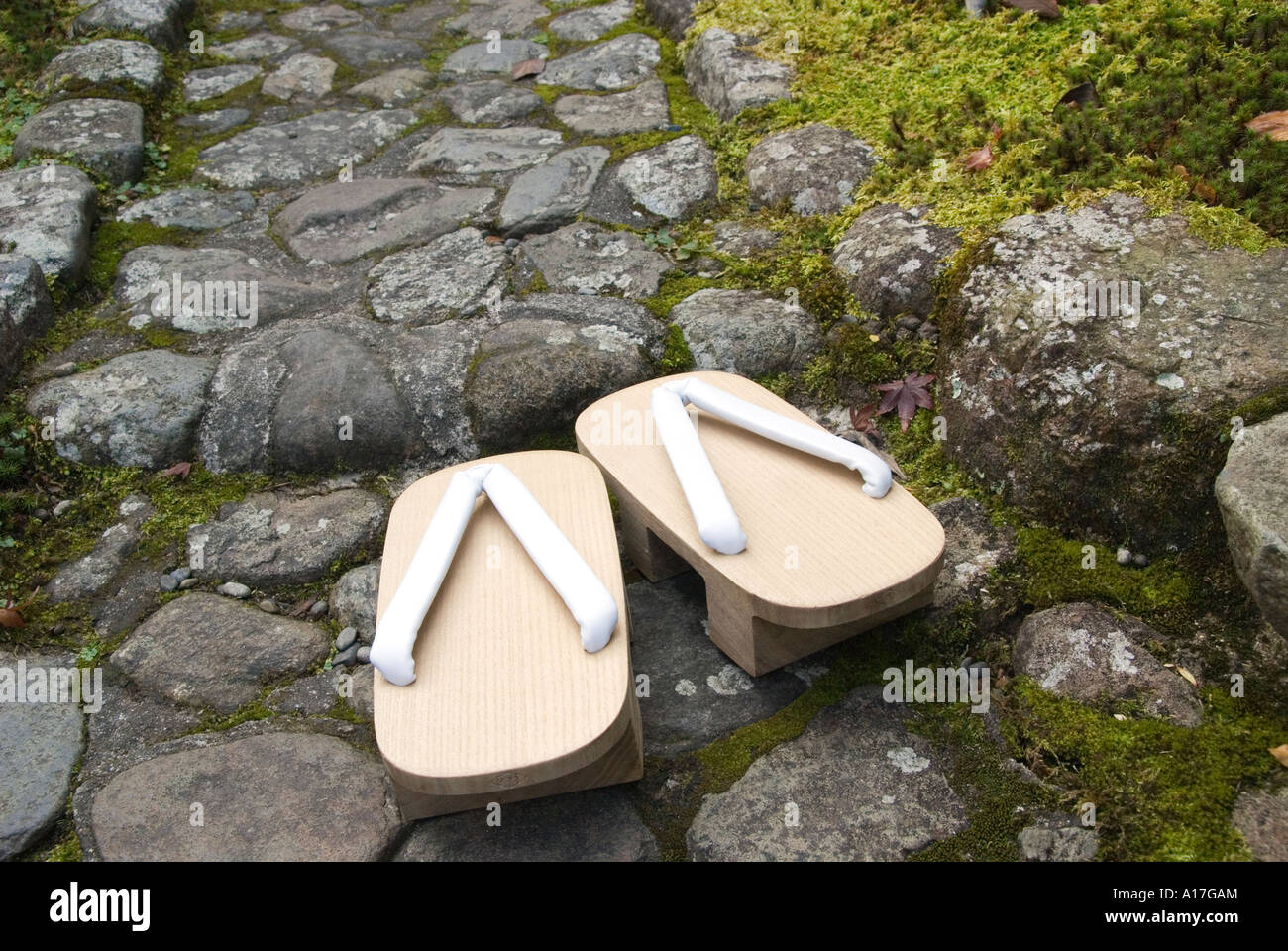 Man's geta on a stone path in a Japanese garden Japan Stock Photo - Alamy