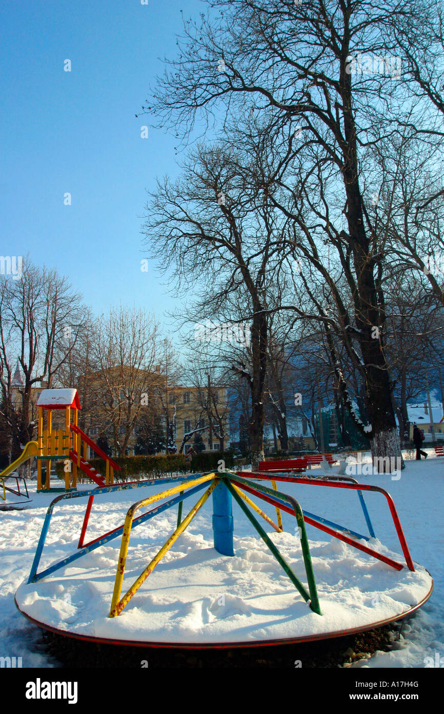 A children's playground covered in snow, Brasov, Transylvania, Romania ...