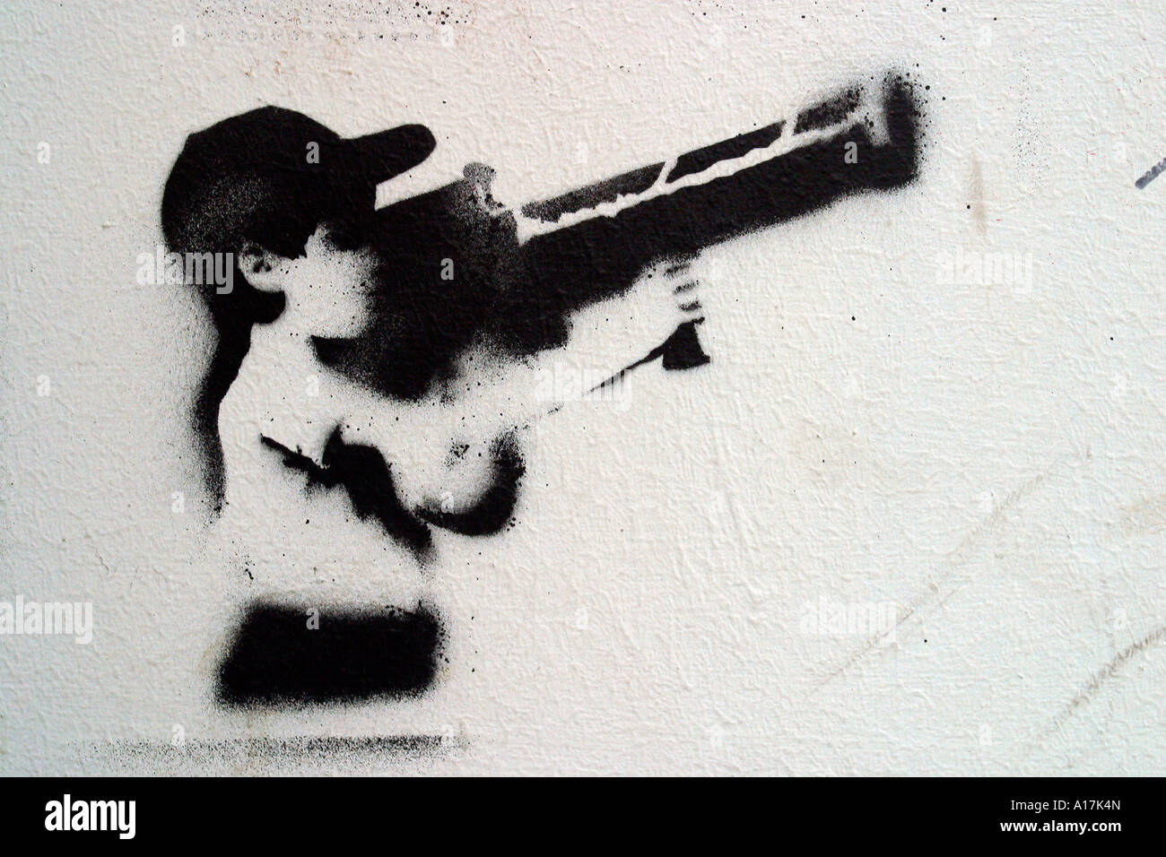 Child with huge Gun, Stencil Graffiti Art Stock Photo - Alamy