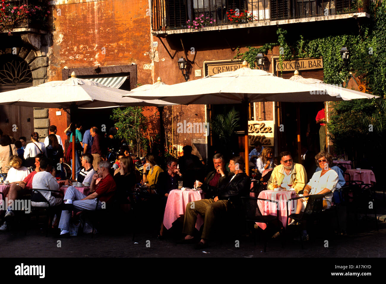 Waiter in outdoor terrace pavement bar cafe Piazza Navona is a city ...