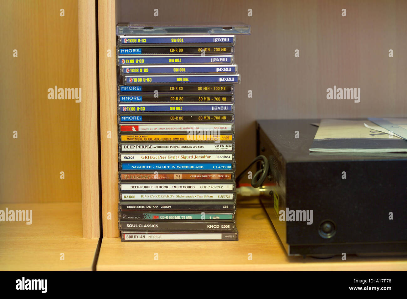 pile of CDs in a bookshelf Stock Photo - Alamy