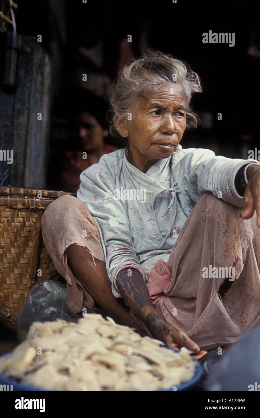 Market scene in Nepal,An old lady selling in the local market in ...