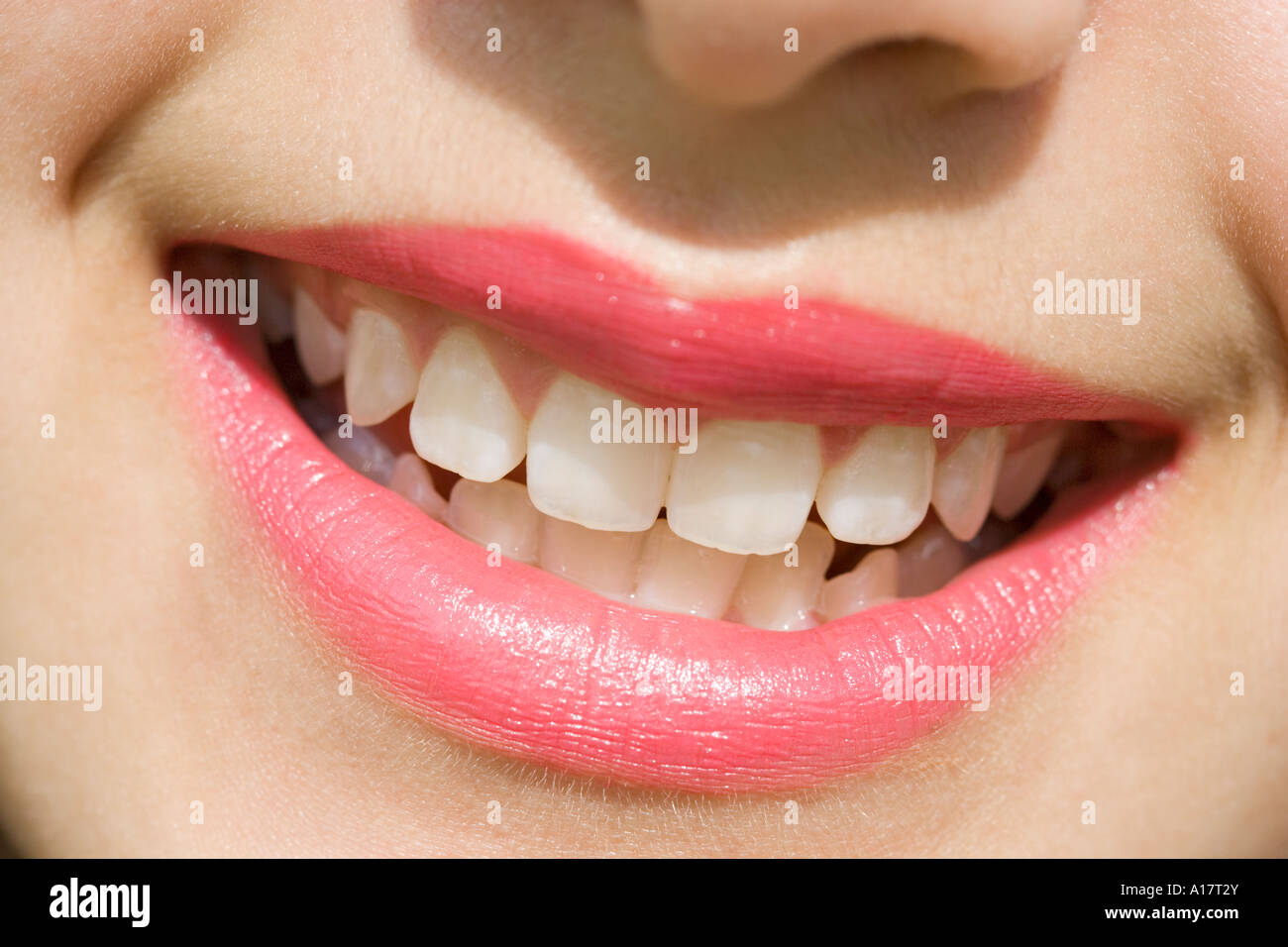 Red Lips of Smiling Teenage Girl Stock Photo - Alamy