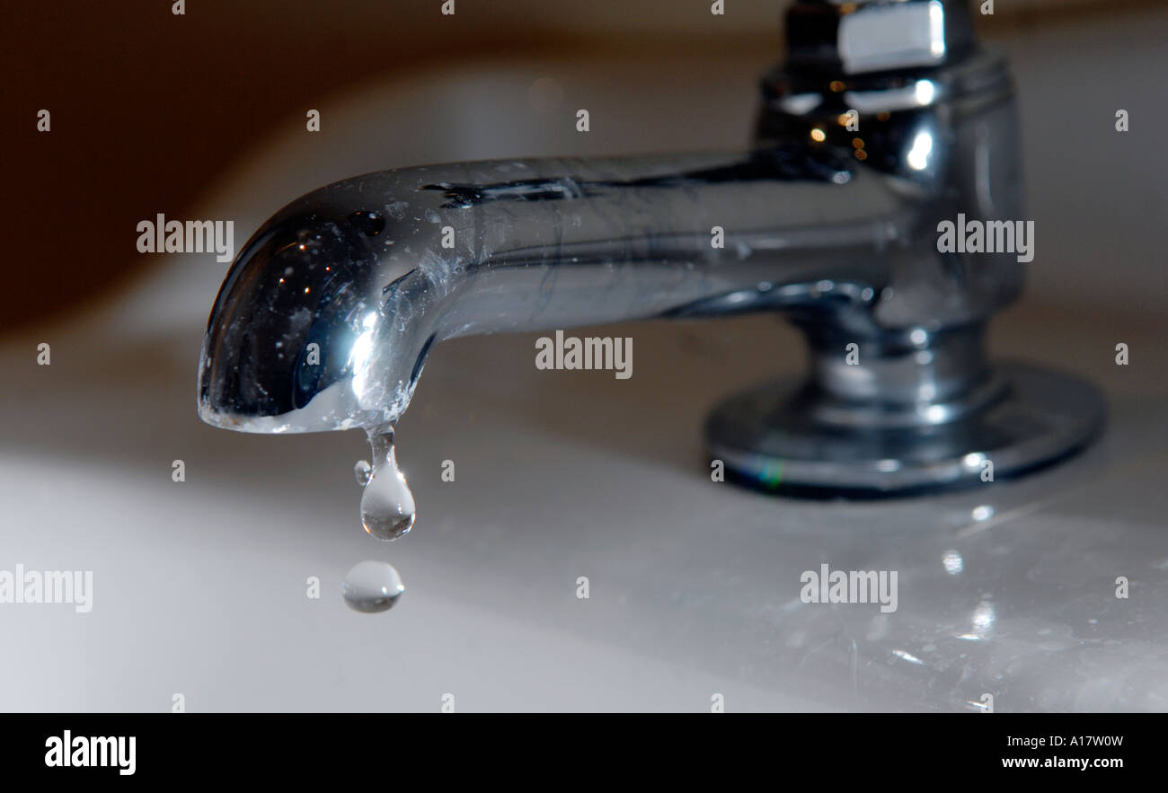 A dripping household tap Stock Photo - Alamy