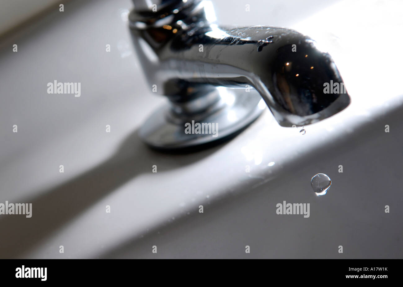 A dripping household tap Stock Photo - Alamy