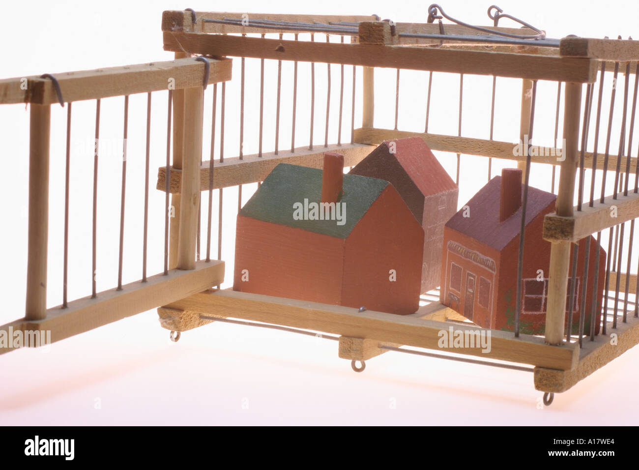 Miniature Houses in Wooden Cage Stock Photo - Alamy