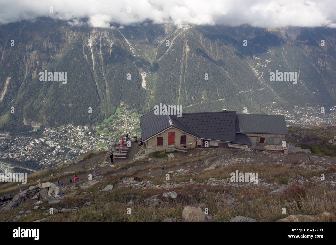 An alpine refuge with the town of Chamonix far below Stock Photo - Alamy