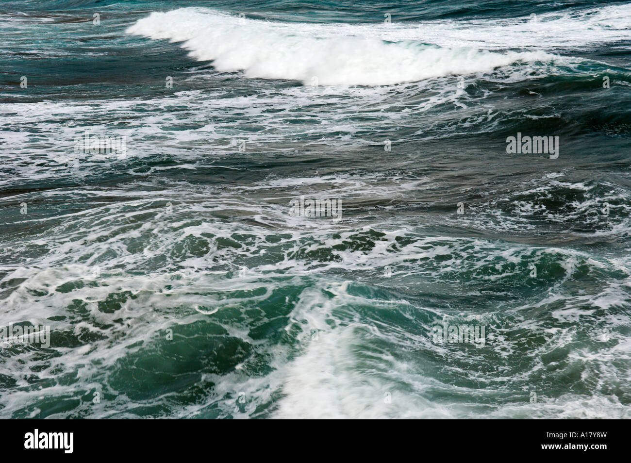 Waves churning rough seas Stock Photo - Alamy