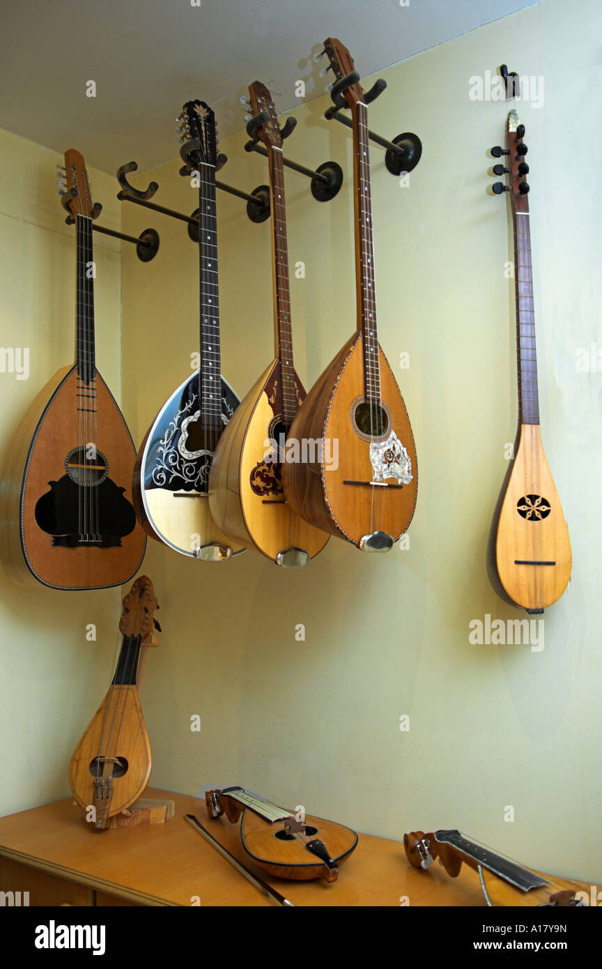 Bouzouki and Cretan violins displayed in shop Stock Photo - Alamy
