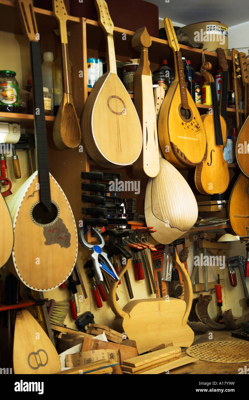 Variety of stringed musical instruments display in shop Stock Photo - Alamy Variety of stringed musical instruments display in shop Stock Photo - Alamy