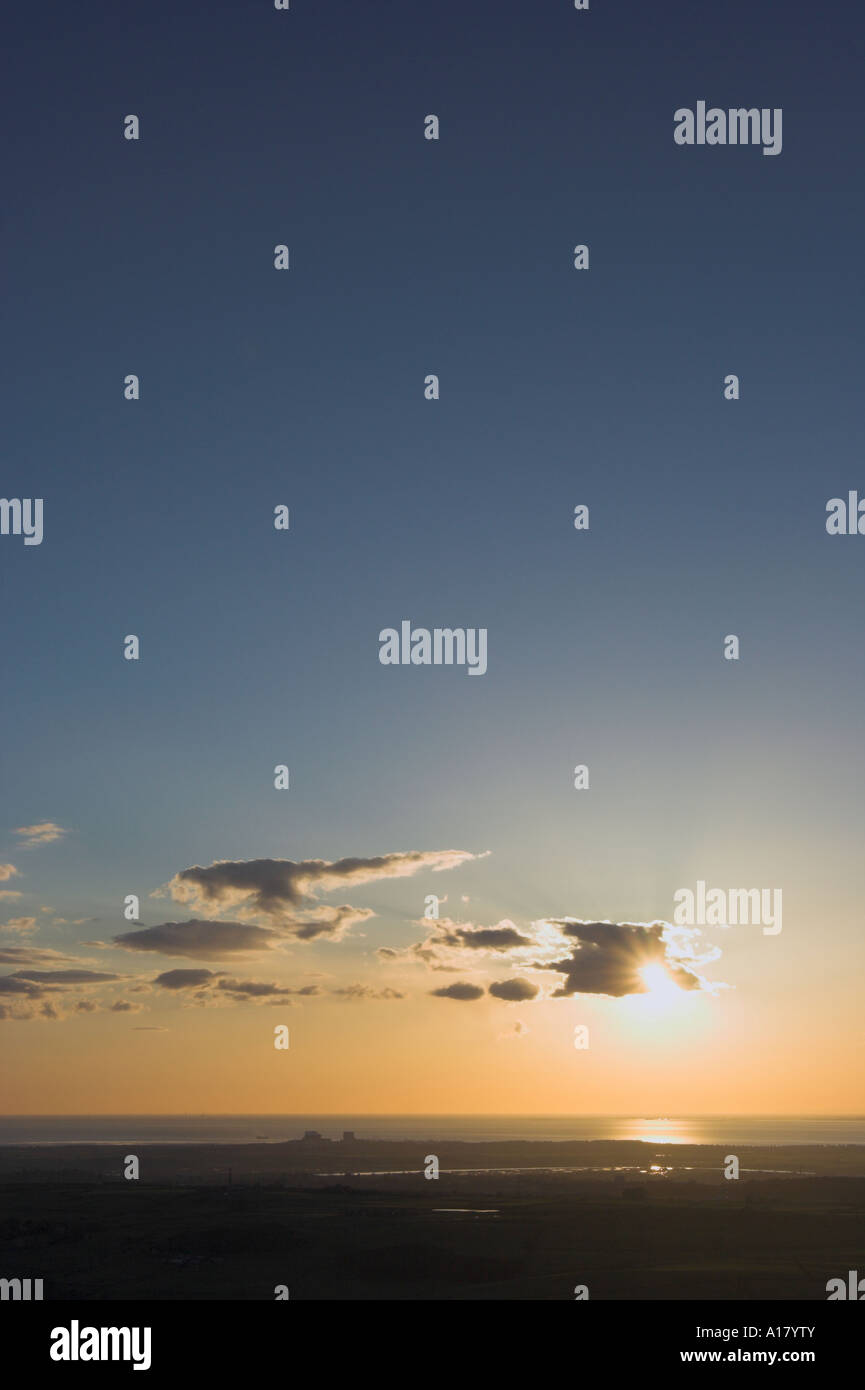 Bursting from behind clouds hi-res stock photography and images - Alamy