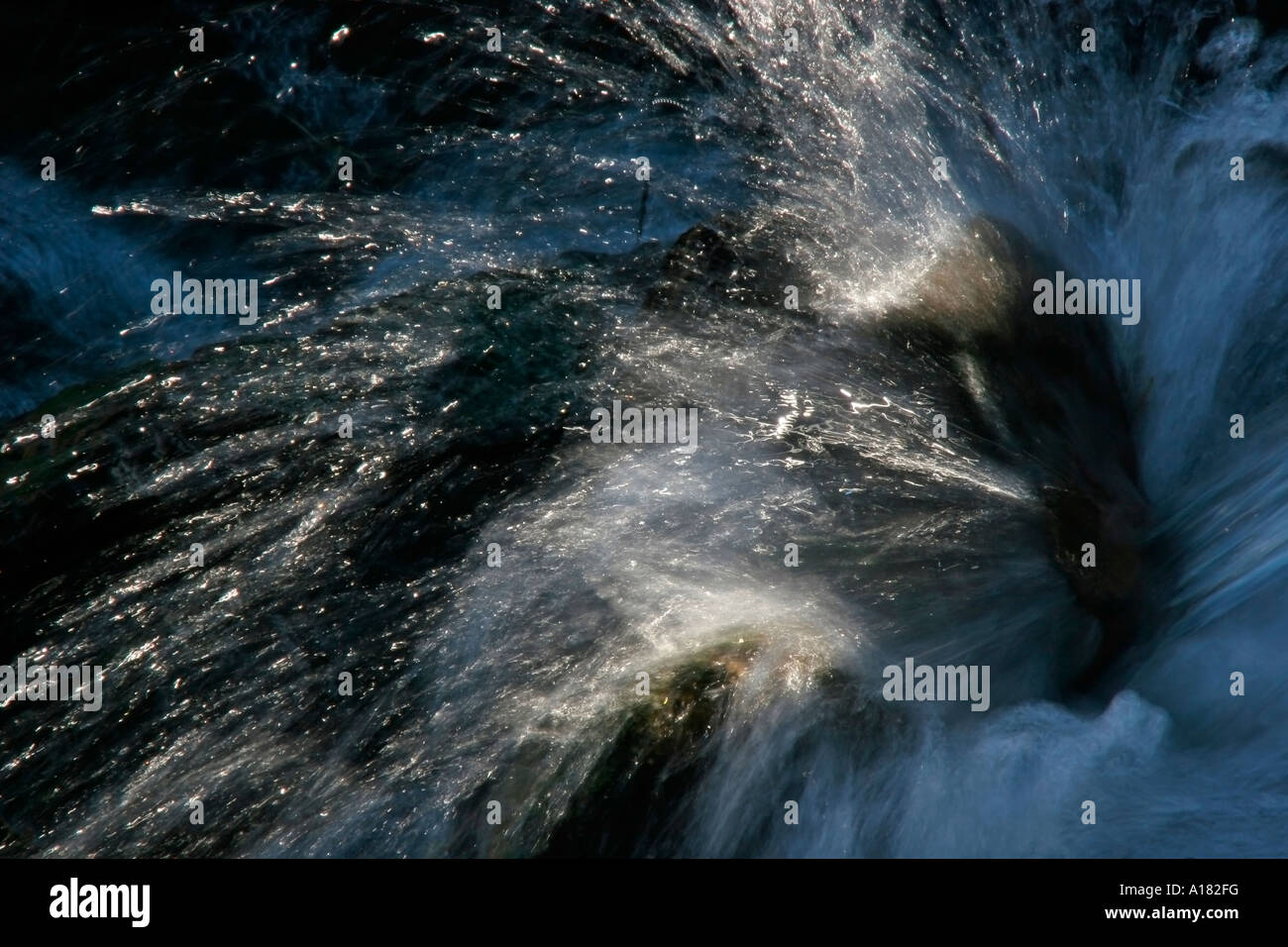 Close up water splashing against rock hi-res stock photography and ...