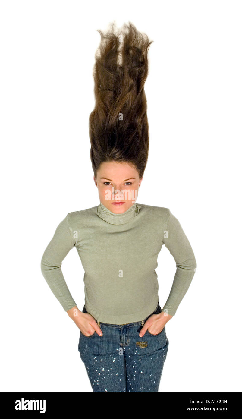 Girl with long hair formed in vertical position Stock Photo - Alamy