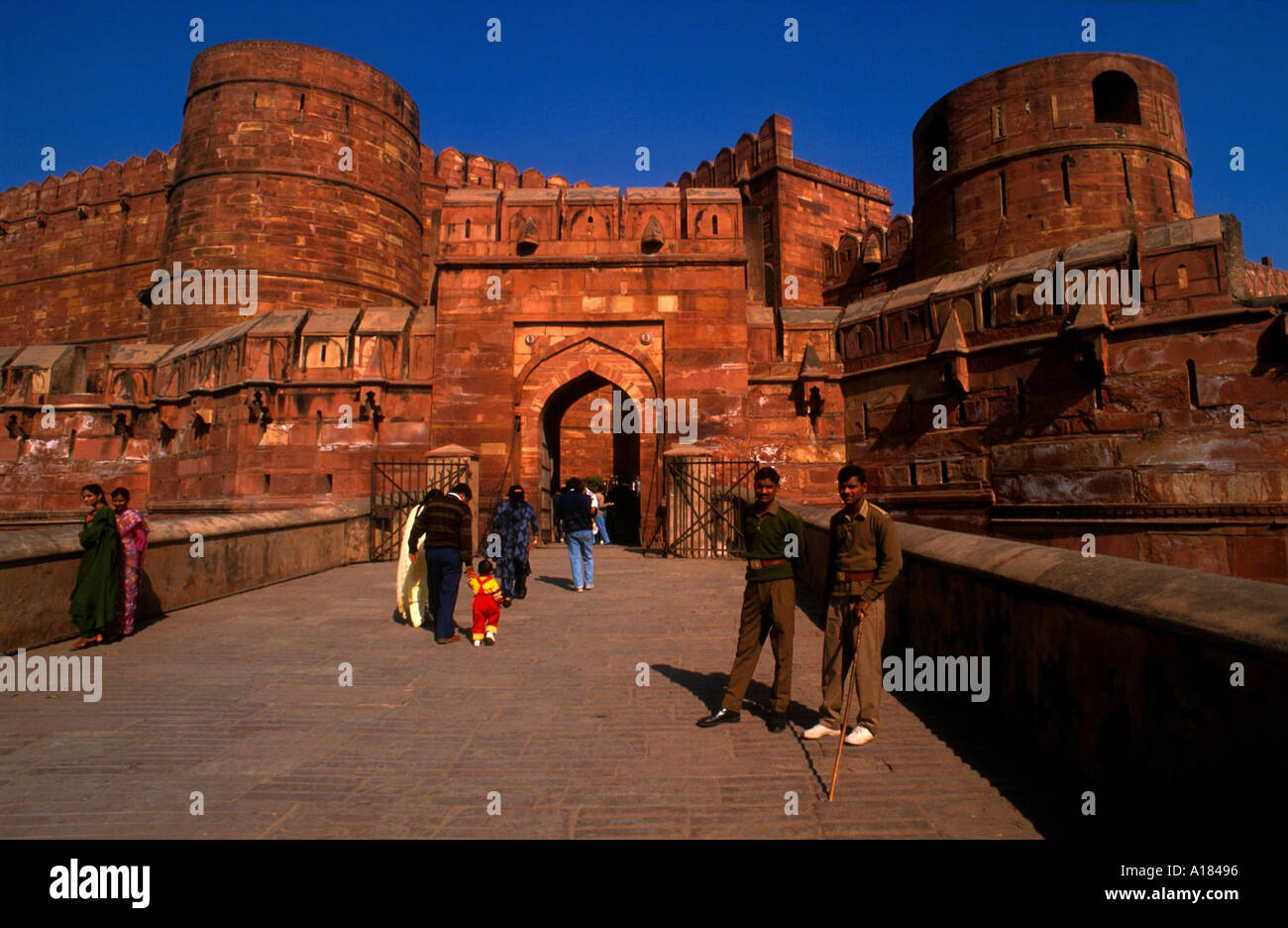 Two soldiers outside the Red Fort built in 1565 by Akbar and finished ...