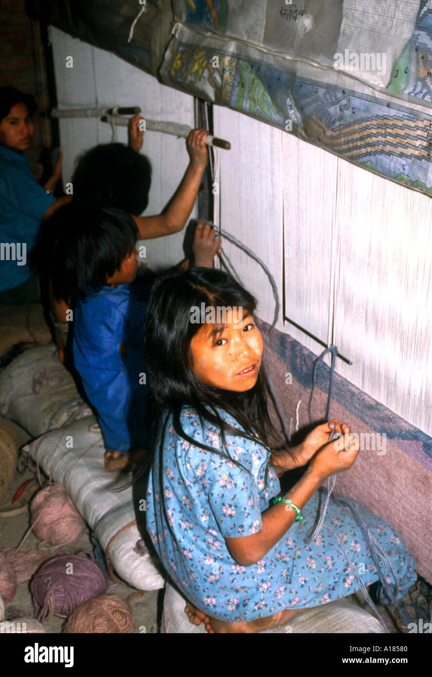 Portrait of child labourer in carpet factory Bhahtapur Kathmandu Valley ...