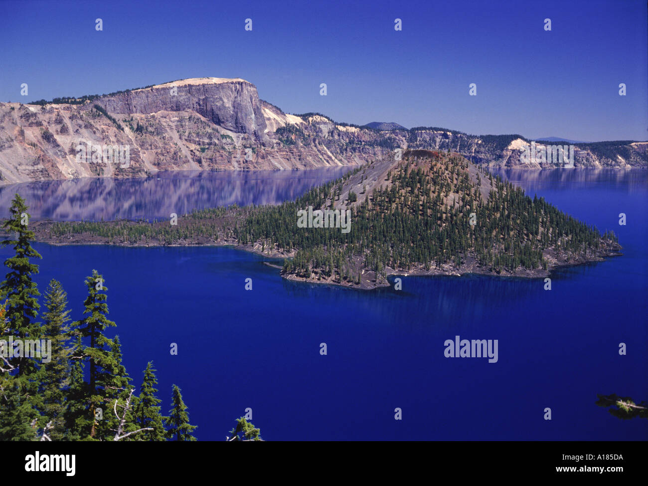 Crater Lake 9km across 550m deep surrounded by 300m high cliffs and ...