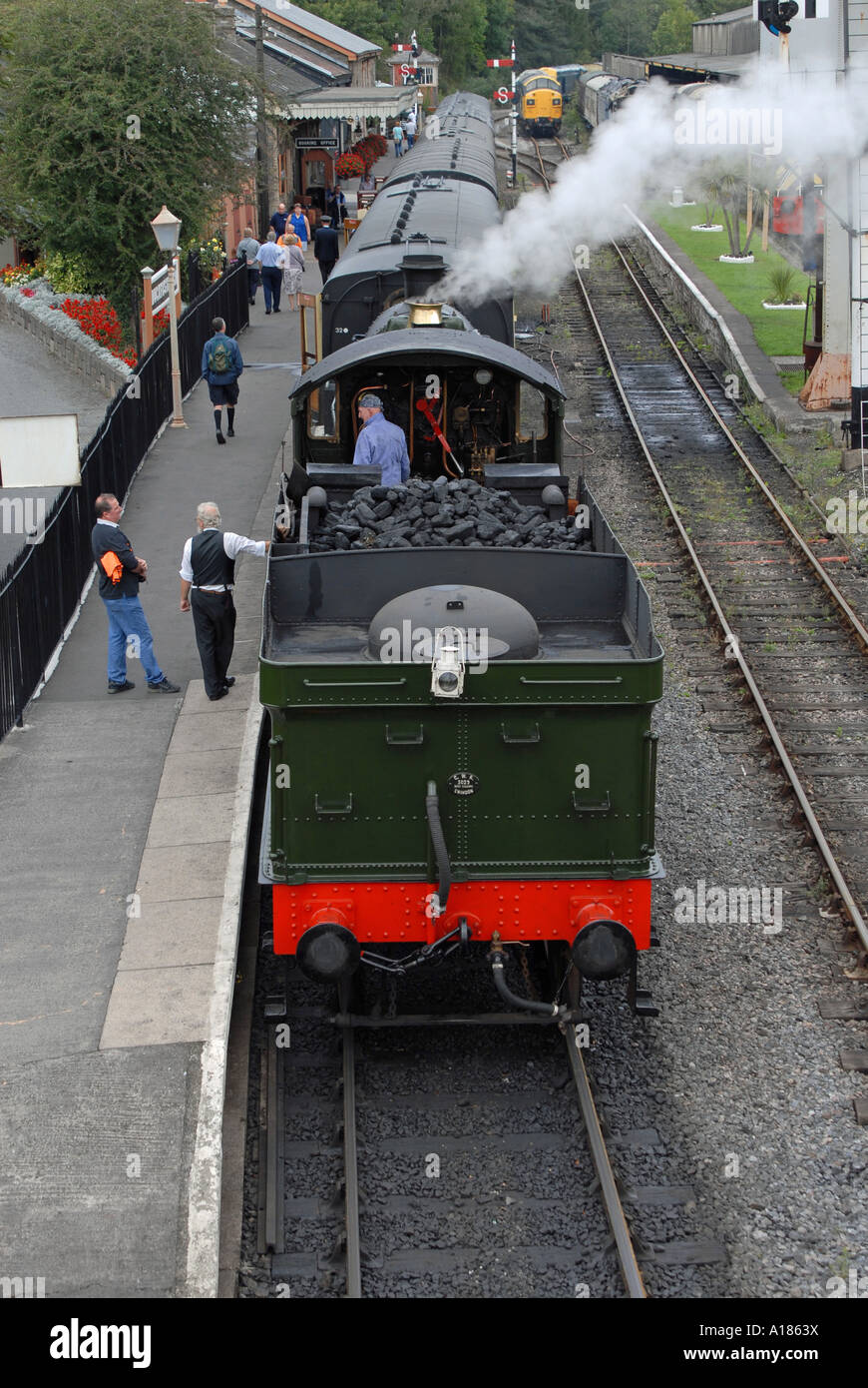 Steam train in station Stock Photo - Alamy