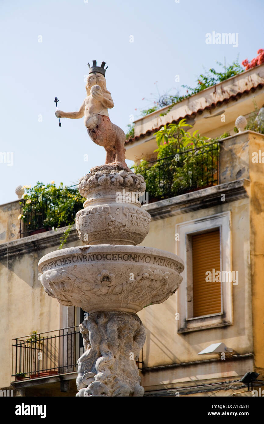Mermaid Fountain in medieval Piazza Duomo square in summer sun with ...