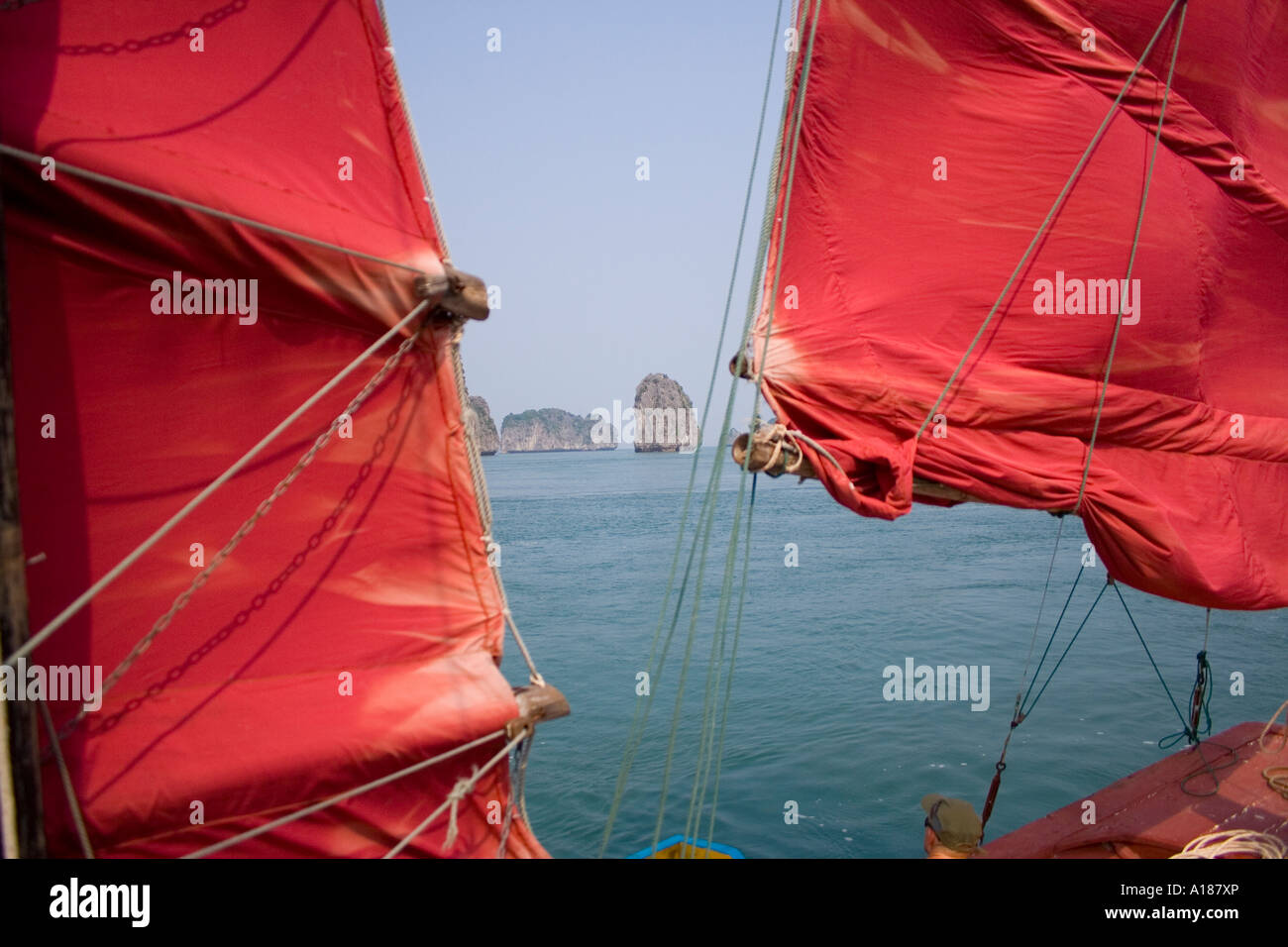 Traditional Vietnamese Sailing Junk Set against Limestone Karst ...