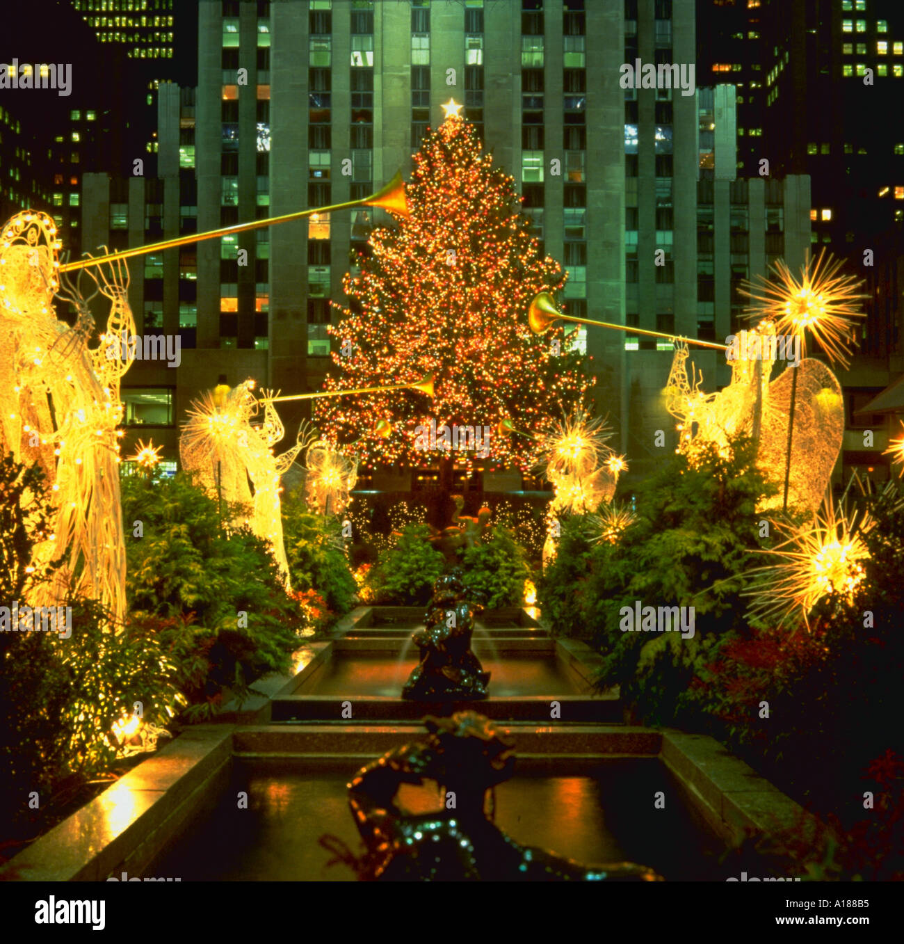 Christmas tree and angel figures at Rockefeller Center at night New ...