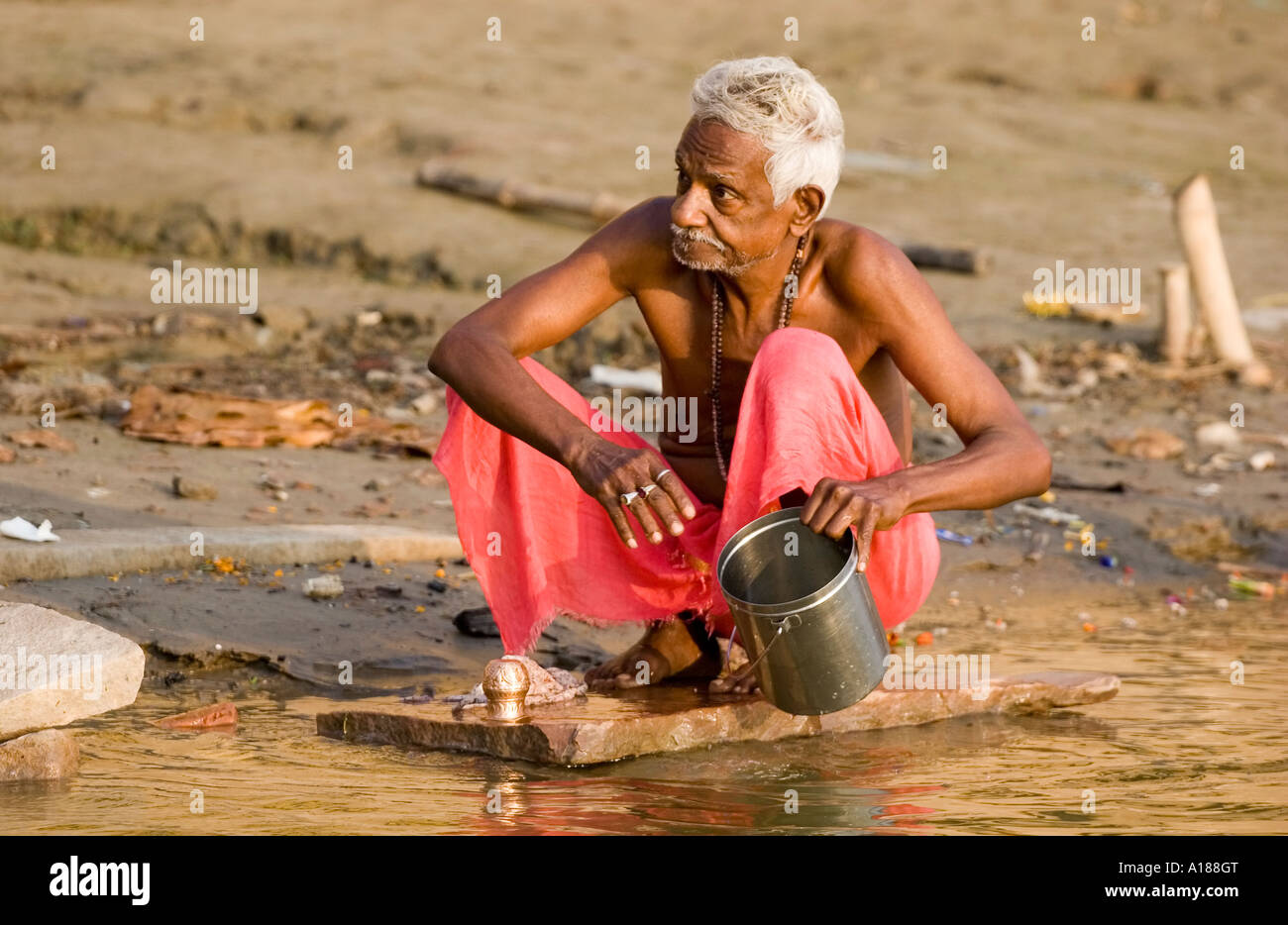 Morning ablutions, Varanasi Stock Photo - Alamy