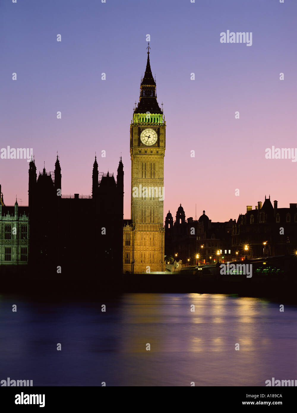 London. England. The clock tower of the Houses of Parliament next to ...