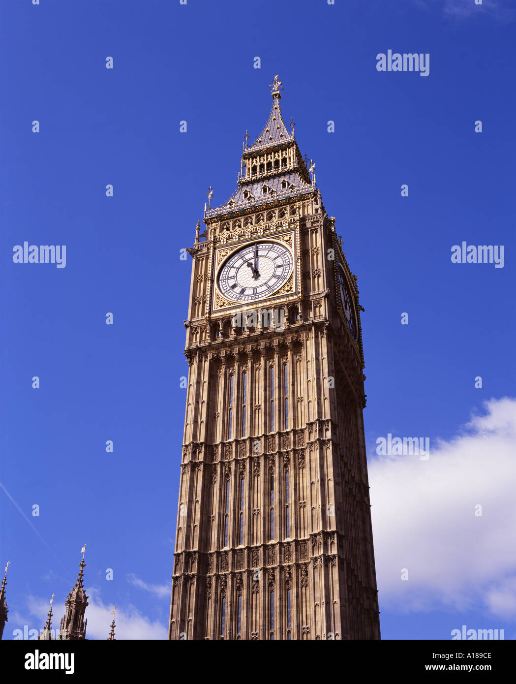 London. England. The Clock Tower at the Houses of Parliament Holding ...