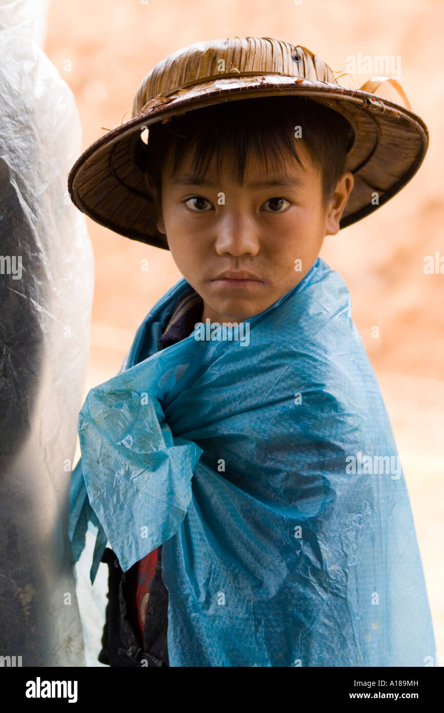 Hmong Boy in the Rain Sapa Vietnam Stock Photo - Alamy