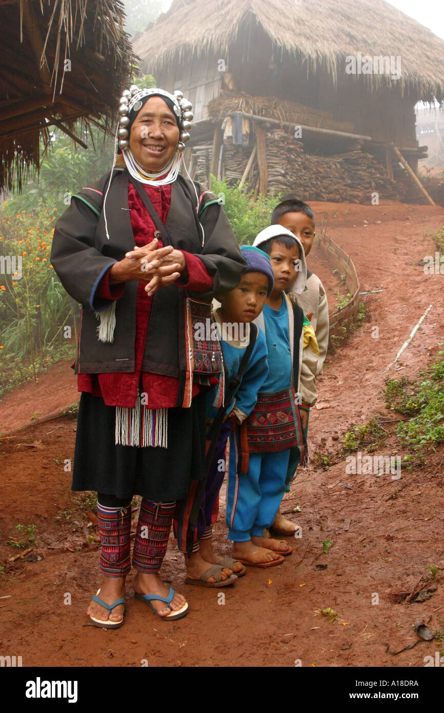 Akha woman with children, Northern Thailand Stock Photo - Alamy
