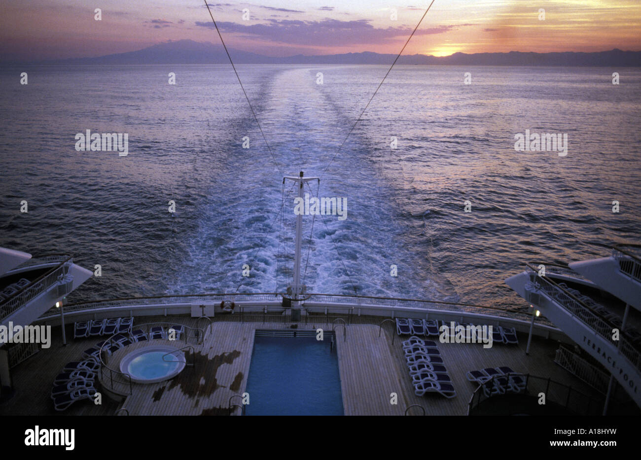 a view from the back of a cruise ship at sunset Stock Photo - Alamy