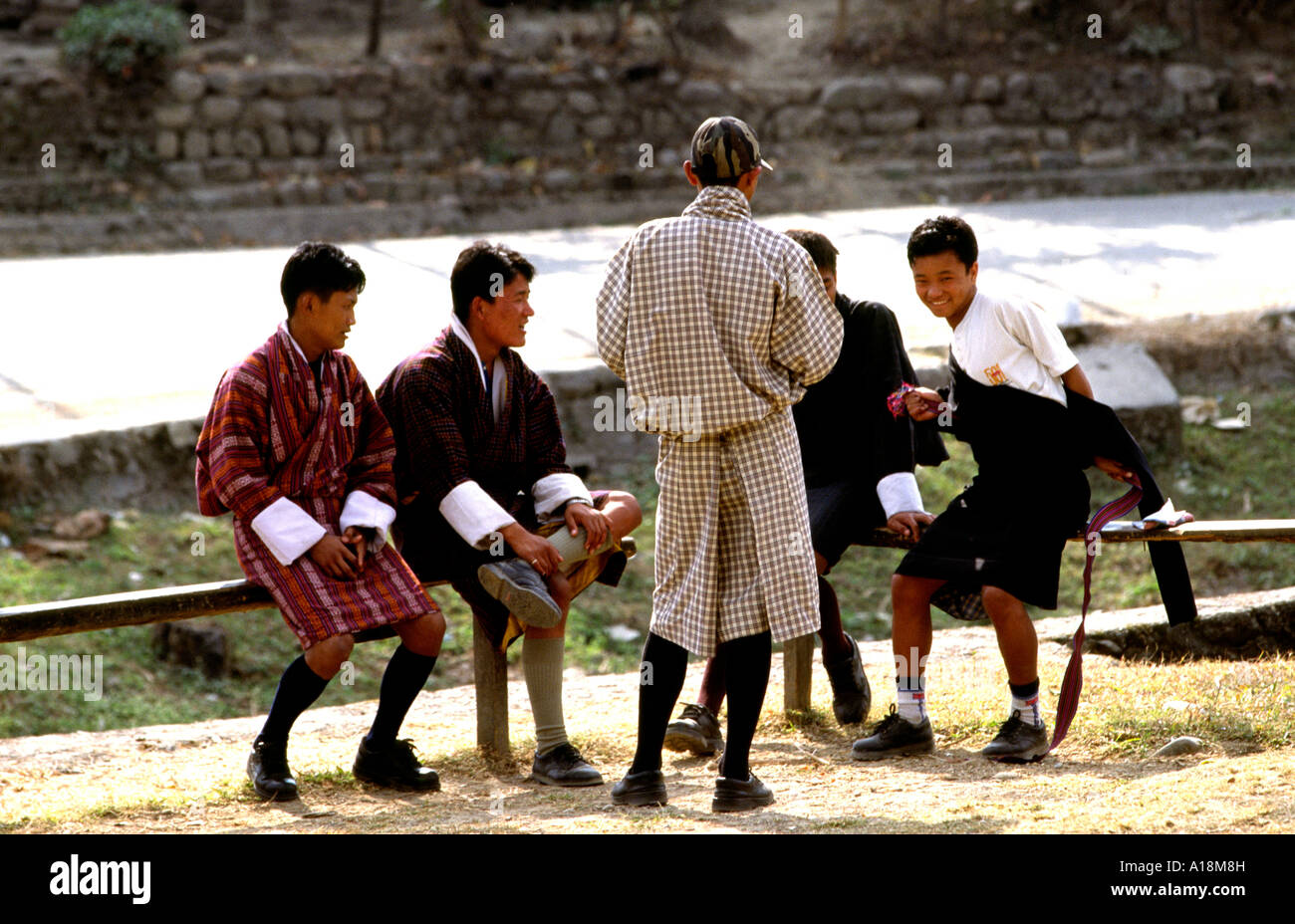 Bhutan Rinchending young Bhutanese men wearing traditional Gho costume ...