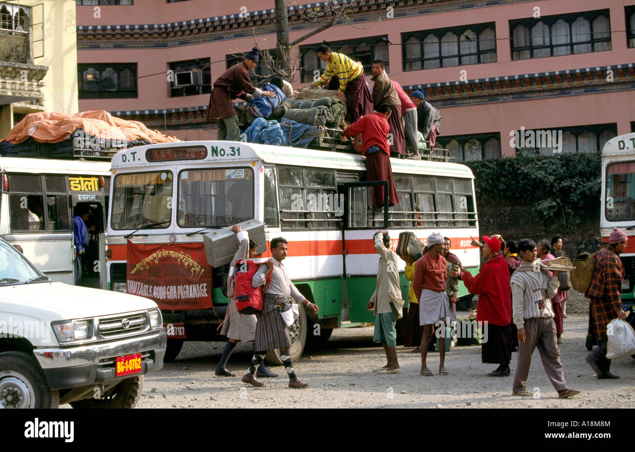 Bhutan Phuentsholing monks loading pilgrimage bus to Gaya Stock Photo ...