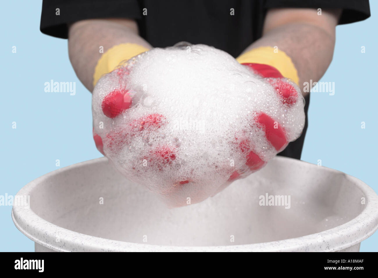 Man Holding some Foam in his Hands Stock Photo - Alamy